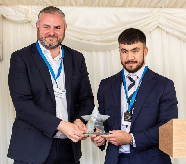 Sam Arrowsmith receives his award from HS2 Minister Andrew Stephenson