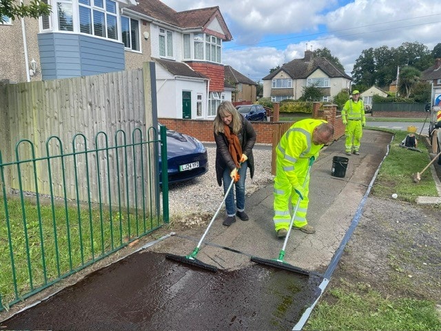 Councillor Karen Rowland and a member of the Council Highways team ...