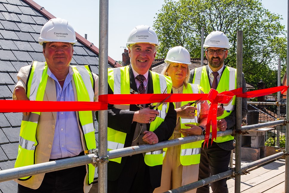 Image 1 - cutting ribbon | Magna Housing News