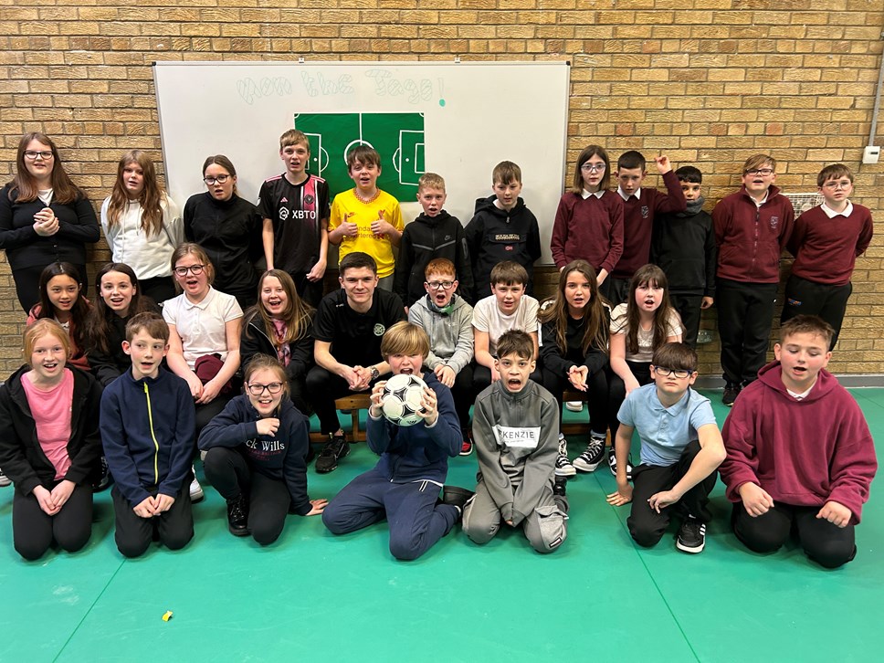 Buckie thistle midfielder Marcus Goodall in group shot with some of ...