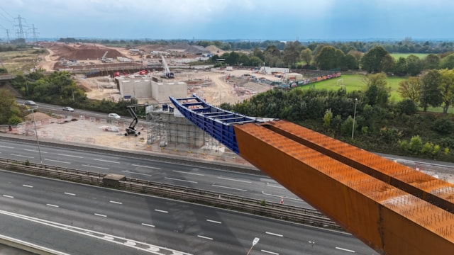 M6 South viaduct being guided over the M6 motorway during the second ...