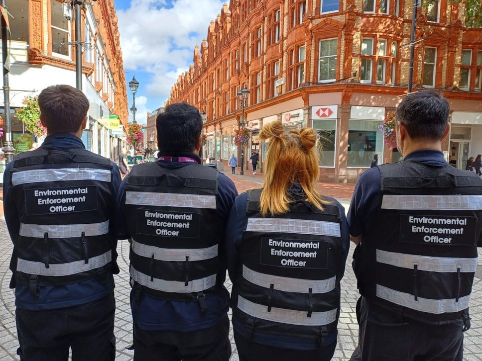 Four of the new environmental enforcement officers in uniform | Reading ...