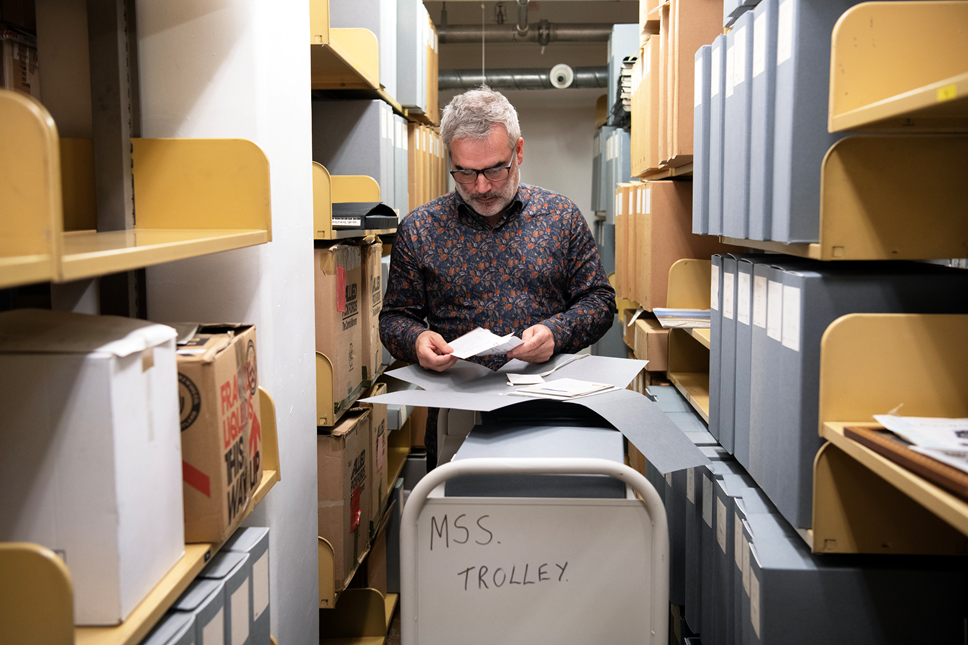 Curator Colin McIlroy in the stacks of the National Library of Scotland ...