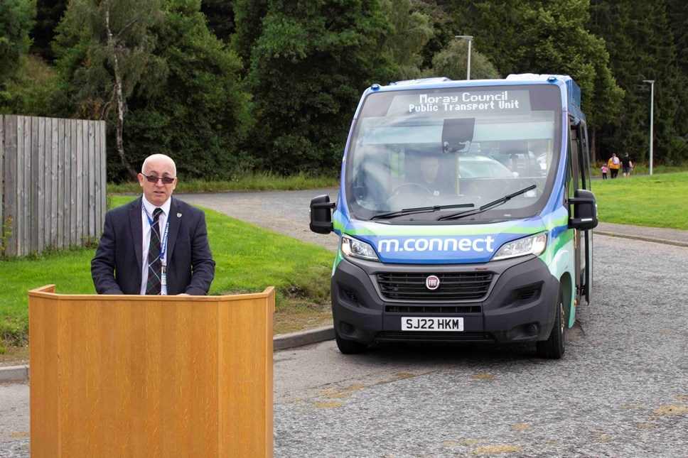 Cllr Marc Macrae with new m connect bus | Moray Council News