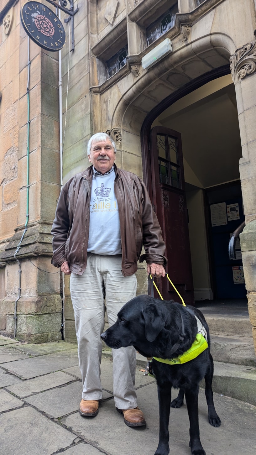 Chris and his guide dog outside Clitheroe Library | Lancashire County ...