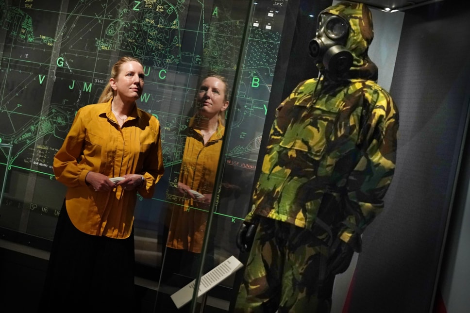 Curator Dr Meredith Greiling puts the finishing touches to Cold War ...