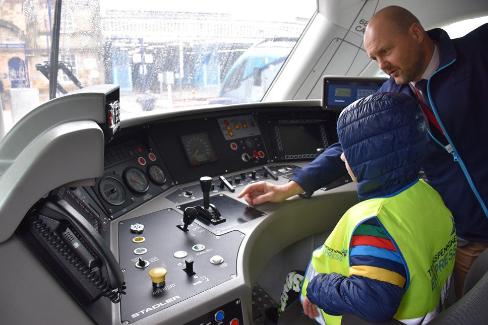Steve Whitehead giving Ernie a tour of the Class 68 driver's cab ...