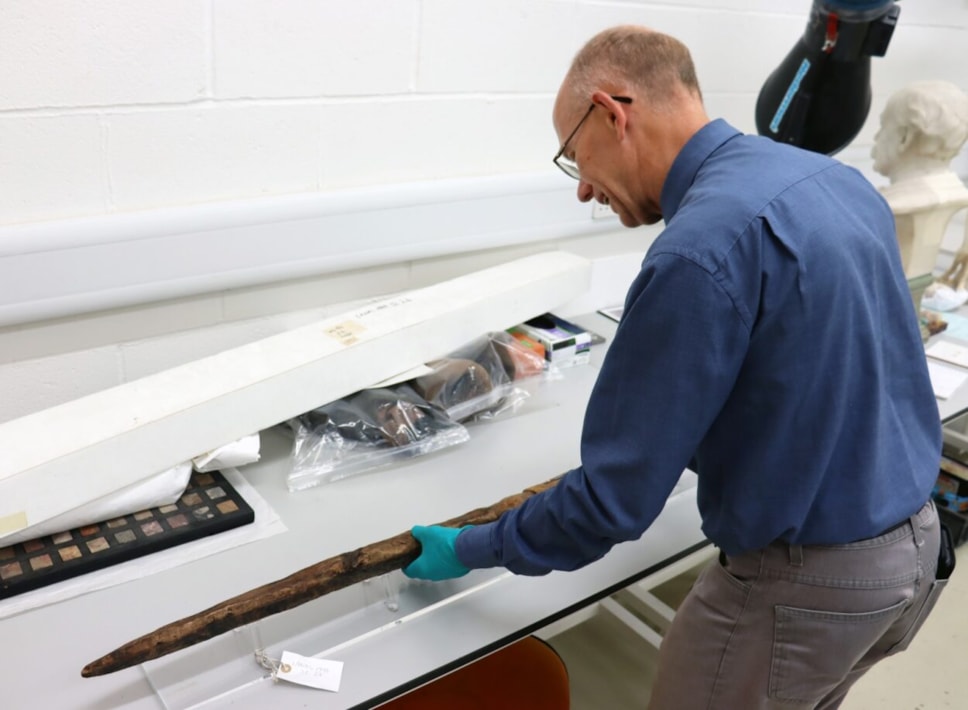Curator Philip Butler working with Roman pilum 2 | Lancashire County ...