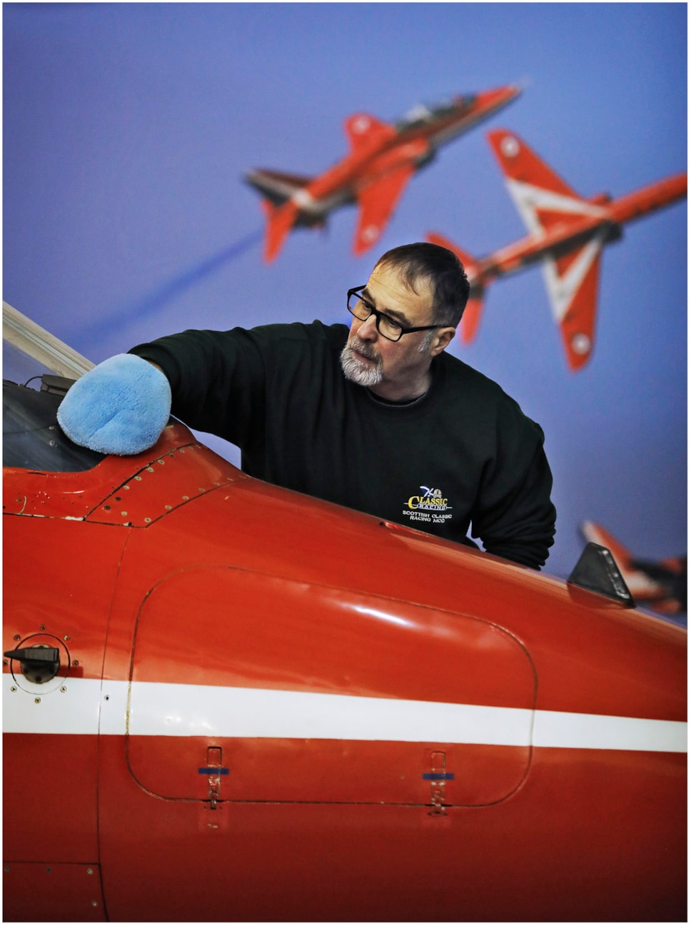 Principal Conservator, Stuart McDonald cleans a Red Arrows Hawk at the ...